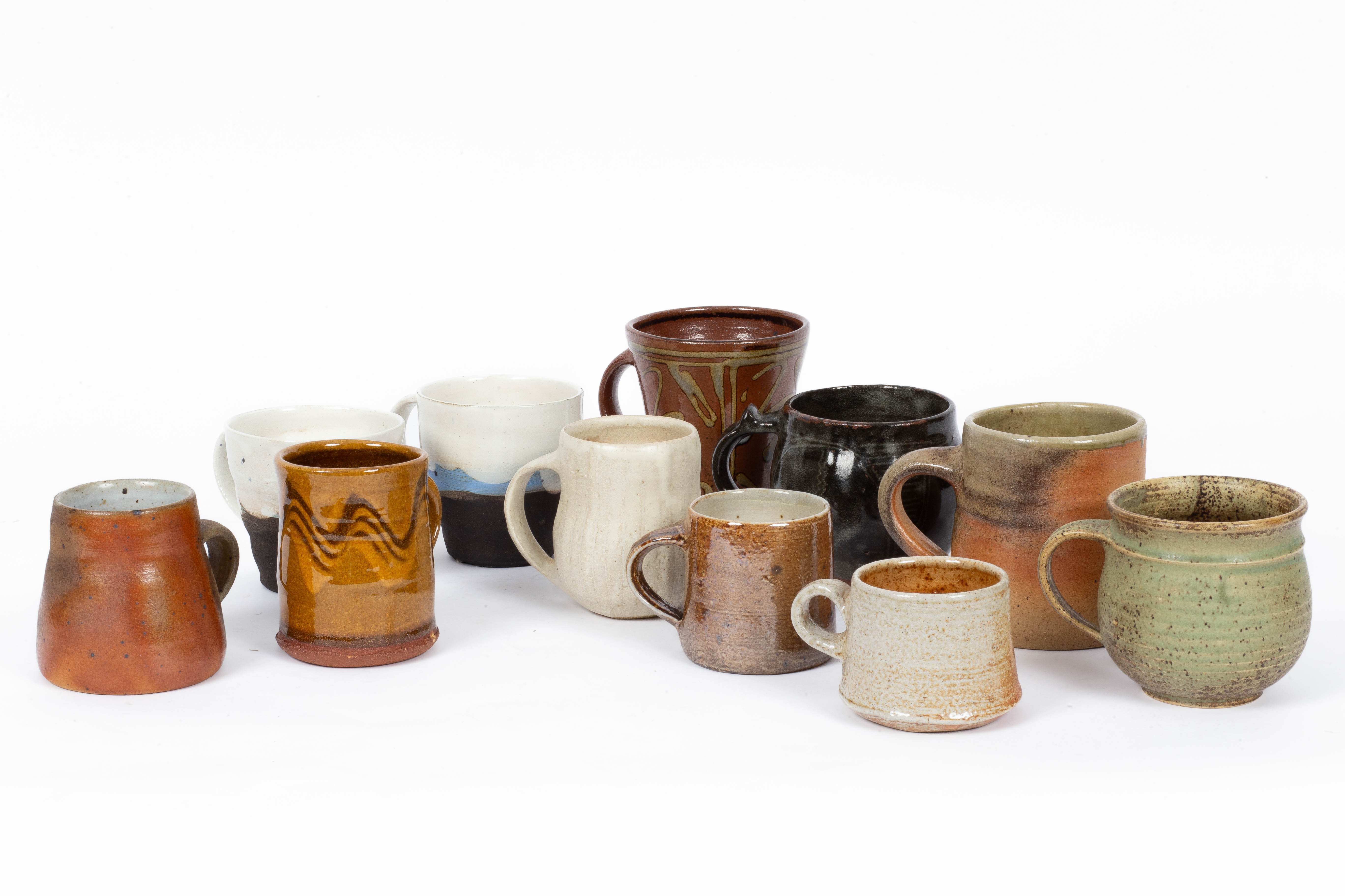 Lot 285 - Various studio pottery mugs