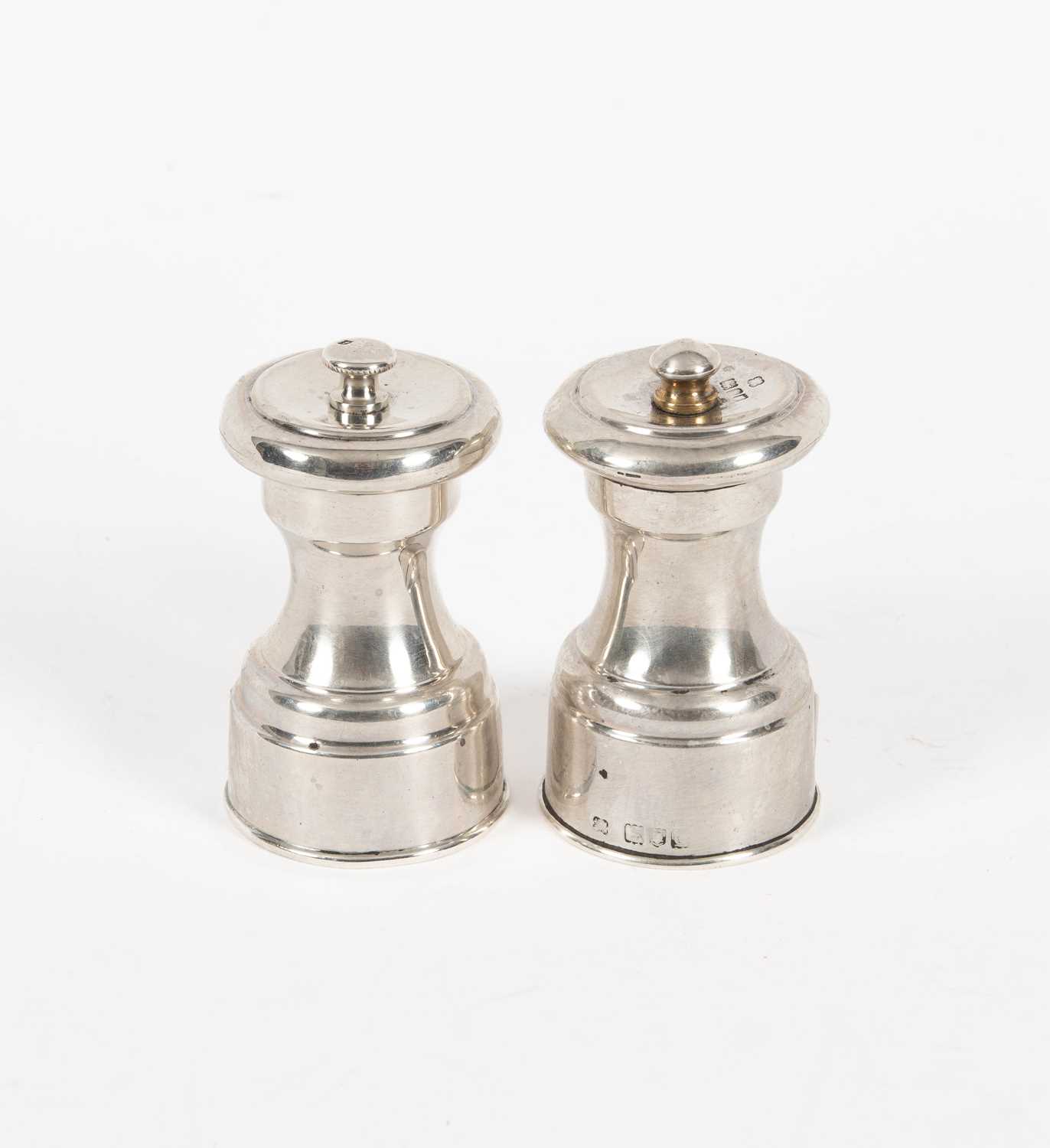 Lot 361 - A pair of Victorian silver pepper mills
