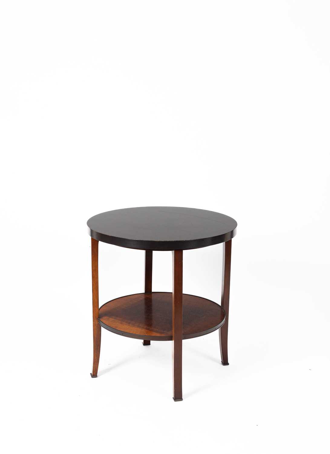 Lot 584 - A circular two-tier table