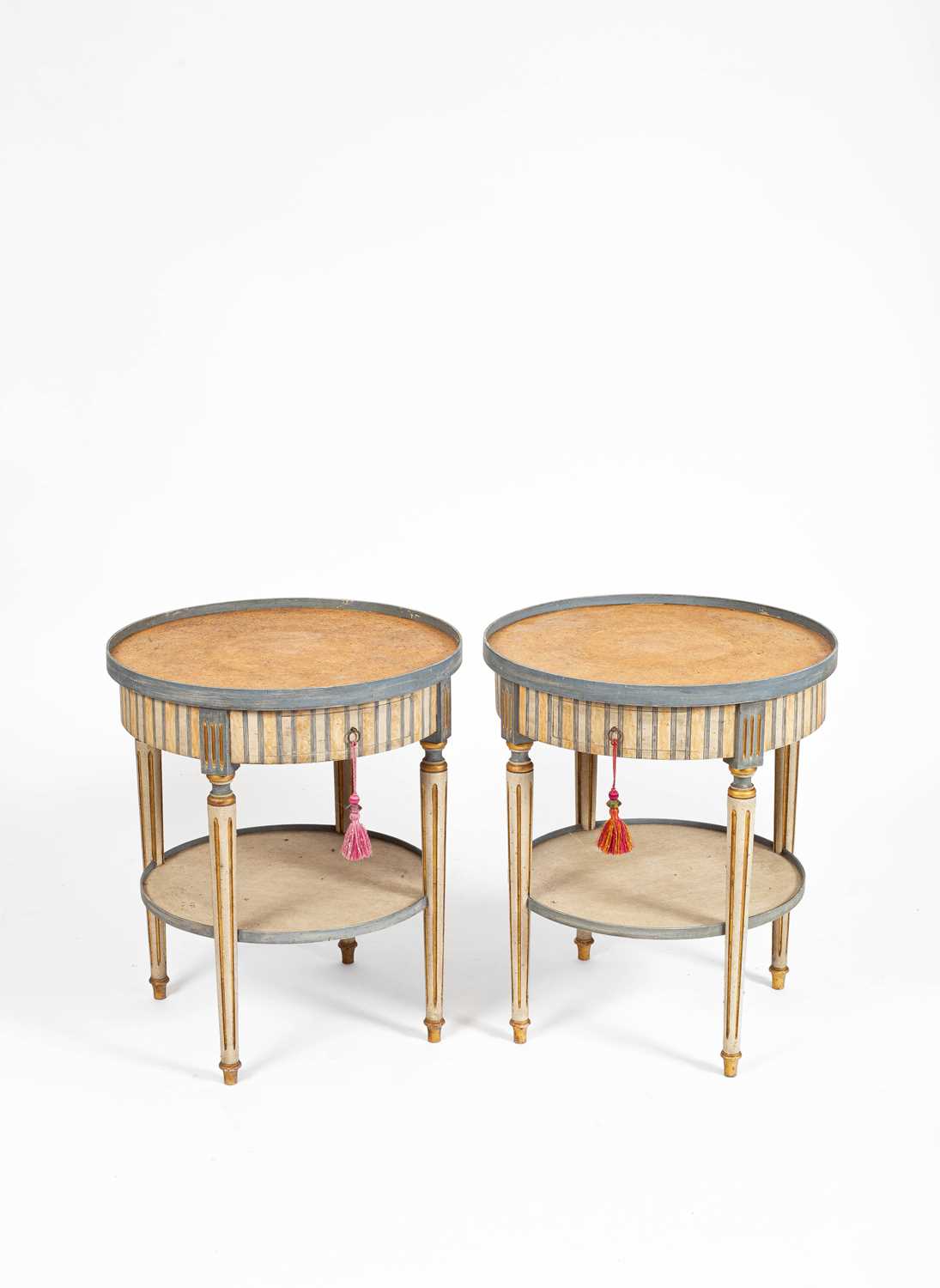 Lot 69 - A pair of painted circular tables