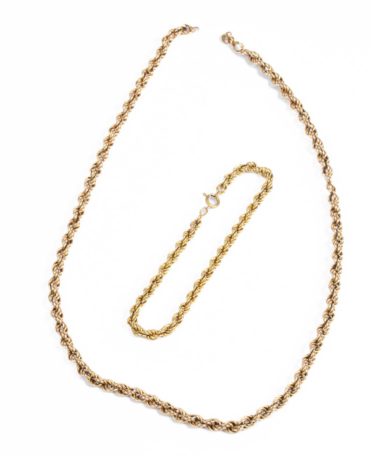 Lot 379 - A 9K gold twist chain necklace and a similar