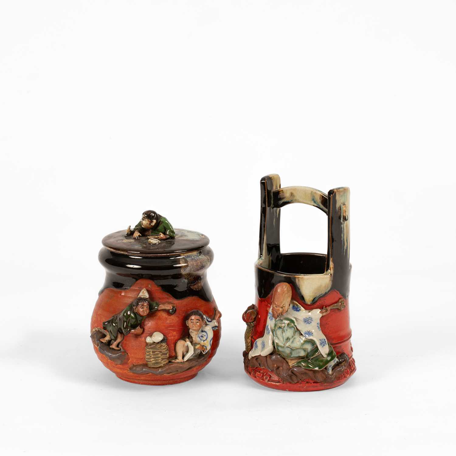 Lot 559 - A Japanese Sumida Gawa Yaki ware lidded pot