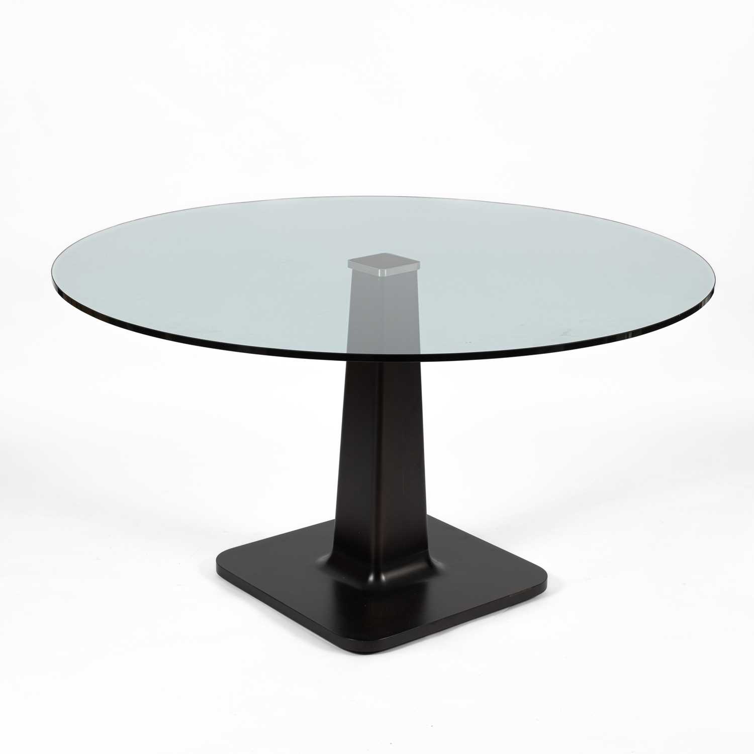 Lot 135 - A circular glass topped table